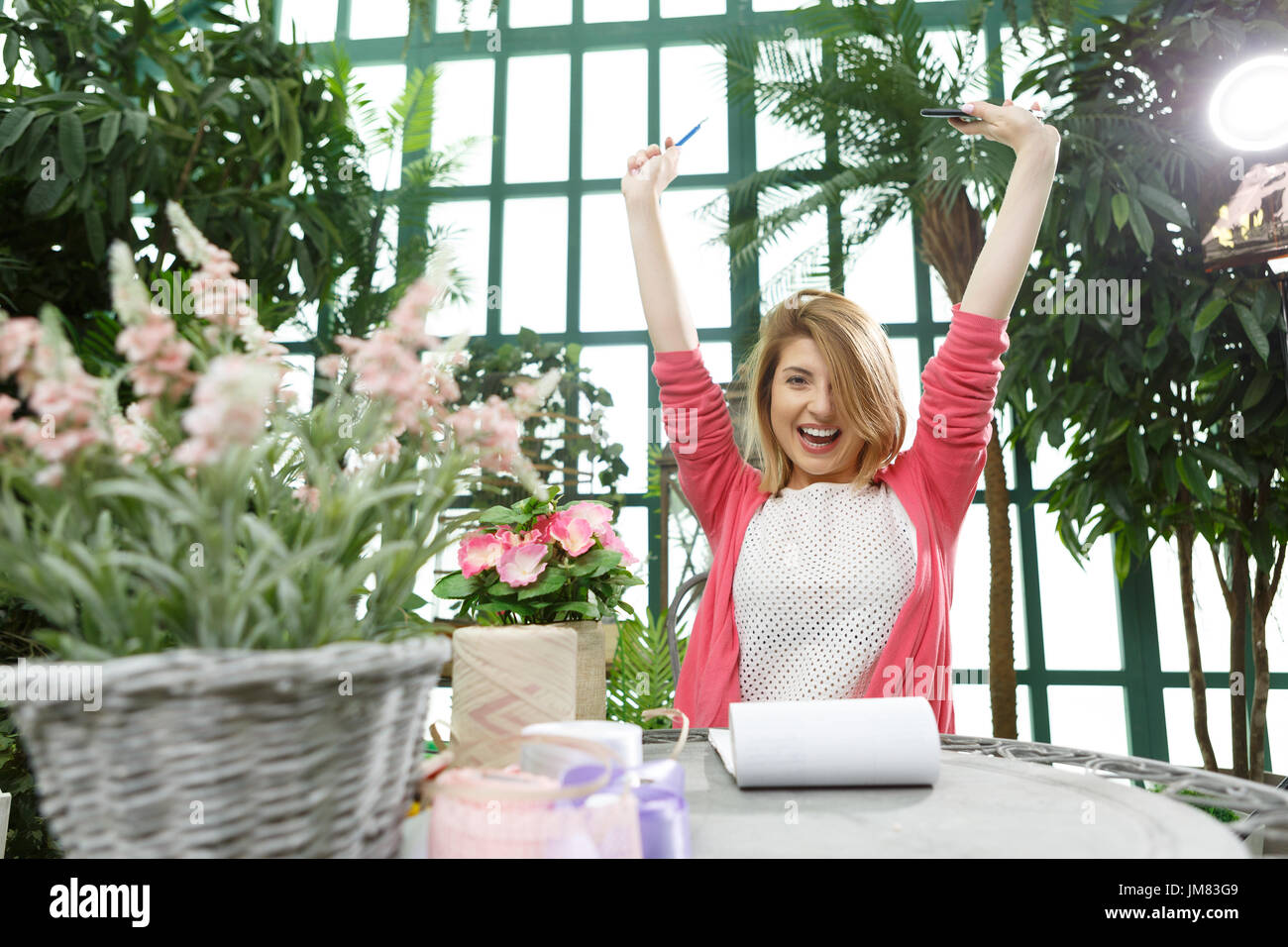 Happy florist hi-res stock photography and images - Alamy