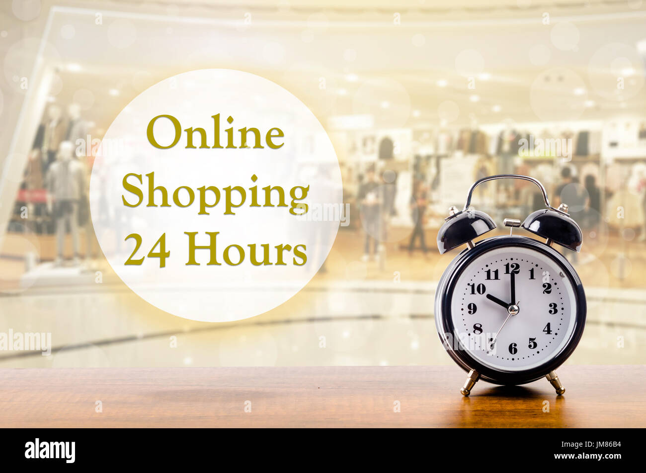 Online shopping 24 Hours and clock on blur supermarket background Stock ...