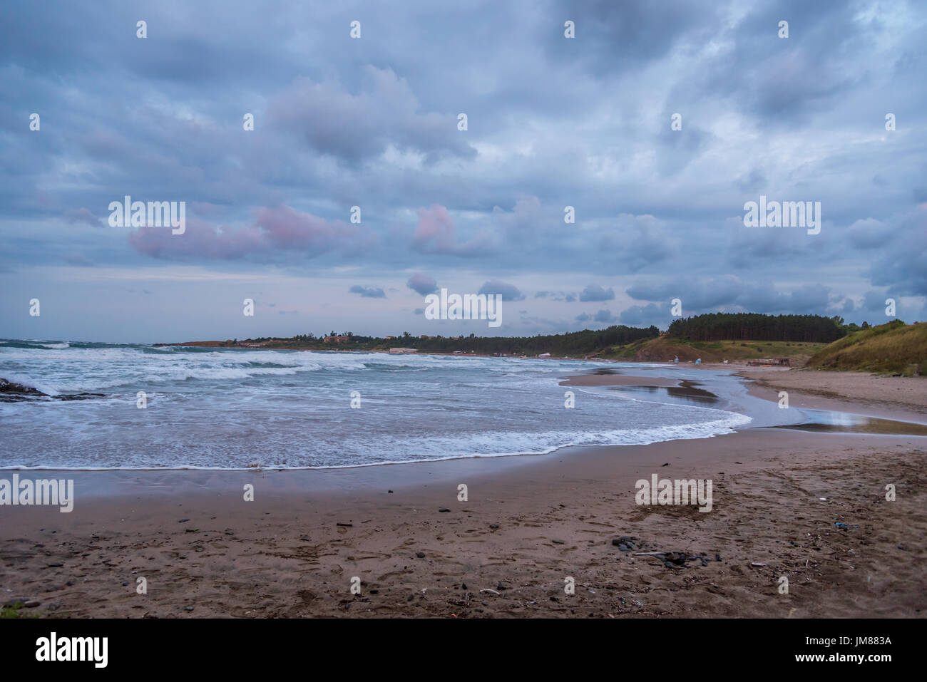 Morning storm clouds over beach on Caribbean Sea in summer Stock Photo ...