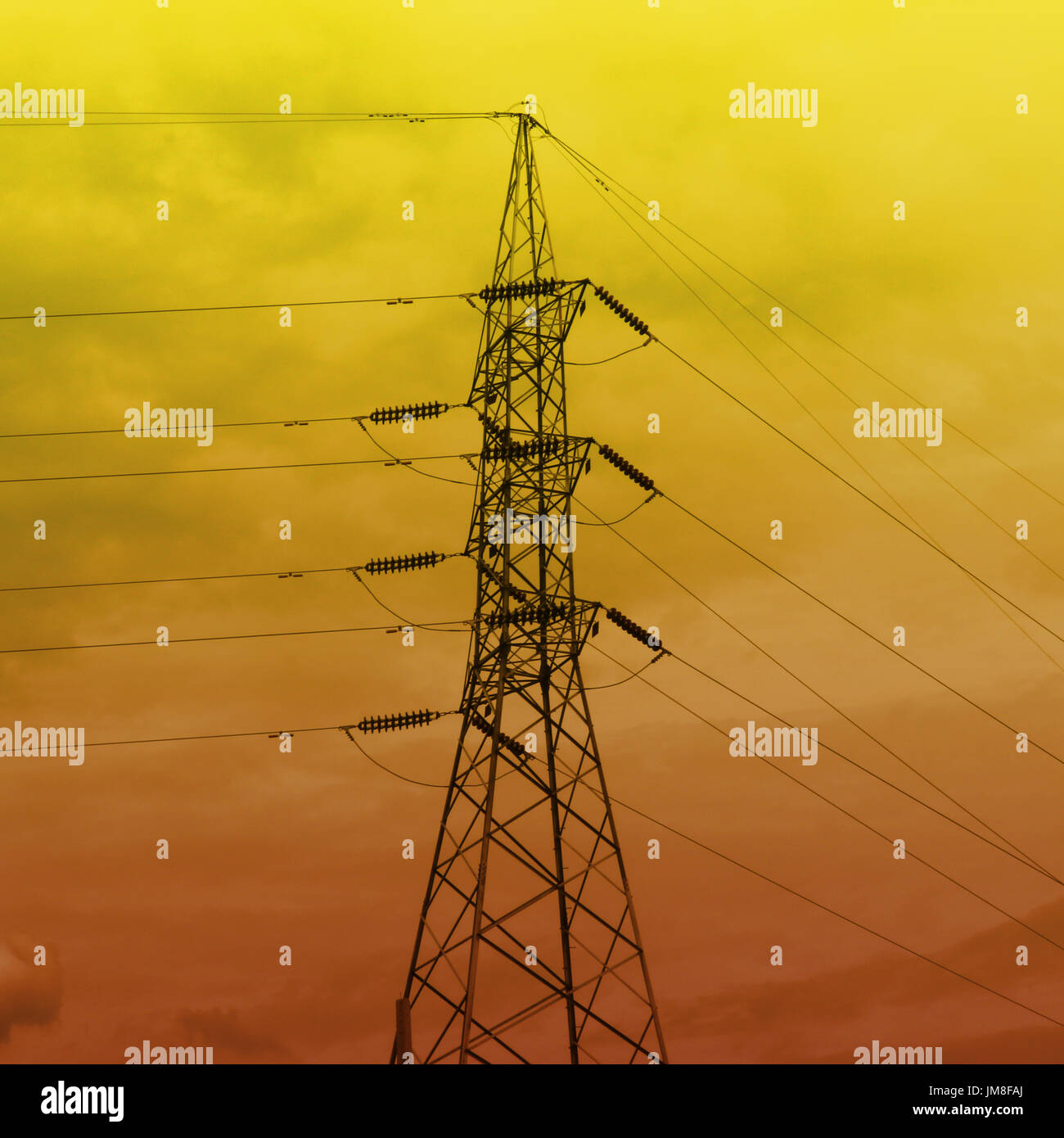 focus at transmission tower standing with sky background Stock Photo ...