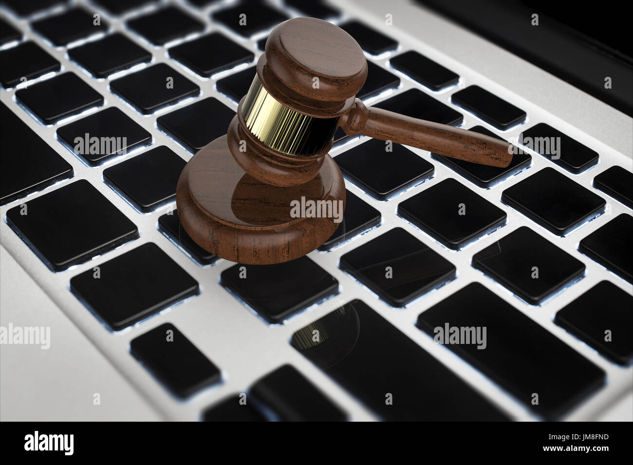 cyber law concept with 3d rendering gavel judge on computer keyboard ...