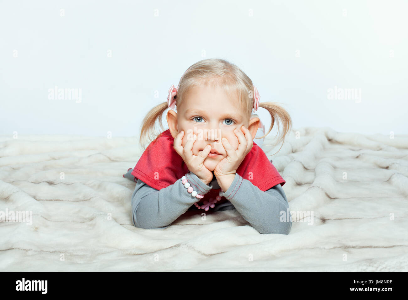 Chin down kid hi-res stock photography and images - Alamy