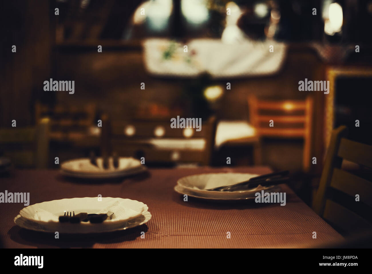 Details of plates and accessories on table, part of vintage style ...