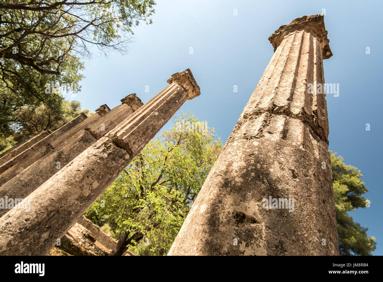 Ionic columns at Ancient Olympia, Greece Stock Photo - Alamy