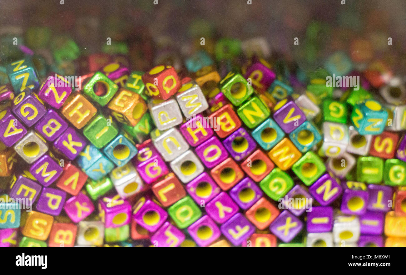 Colorful alphabet letter cubes in view Stock Photo - Alamy