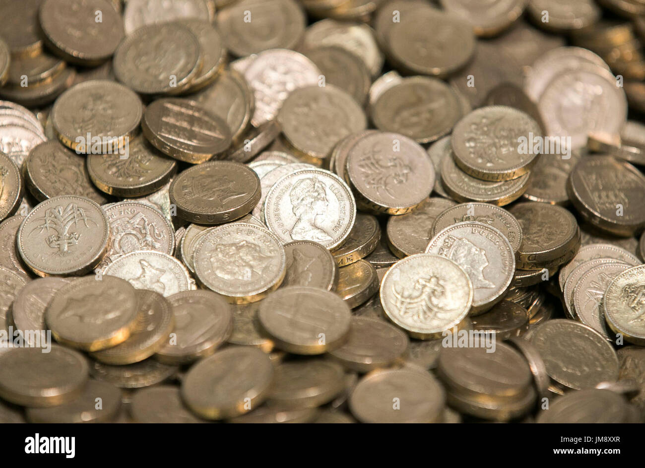 Old one pound coins during hi-res stock photography and images - Alamy