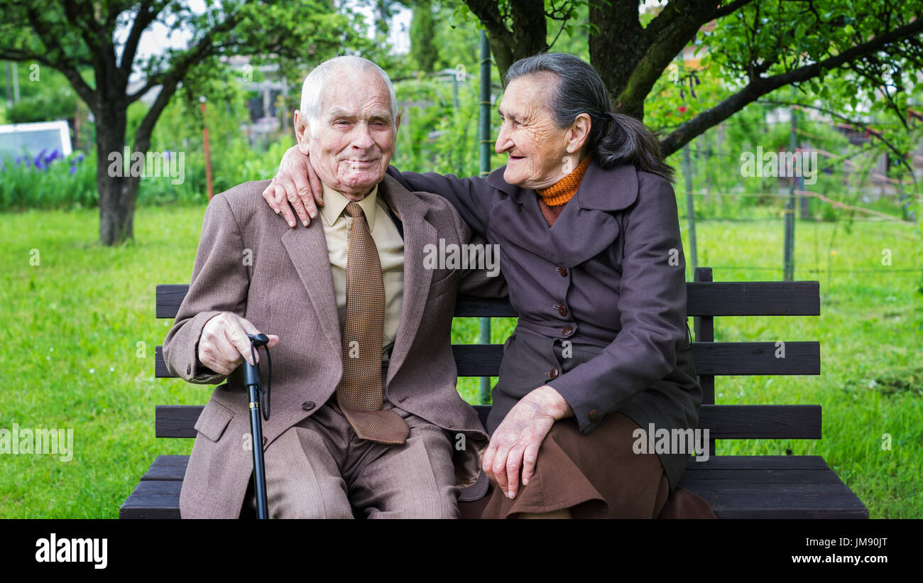 Cute 80 plus year old married couple posing for a portrait in their ...