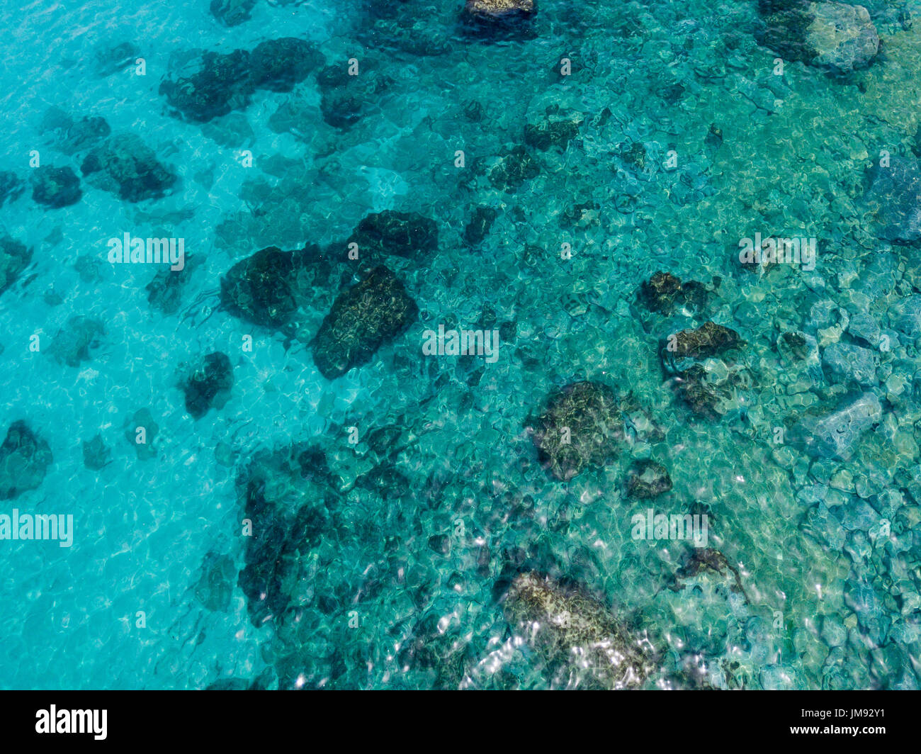 Aerial view of rocks on the sea. Overview of the seabed seen from above ...
