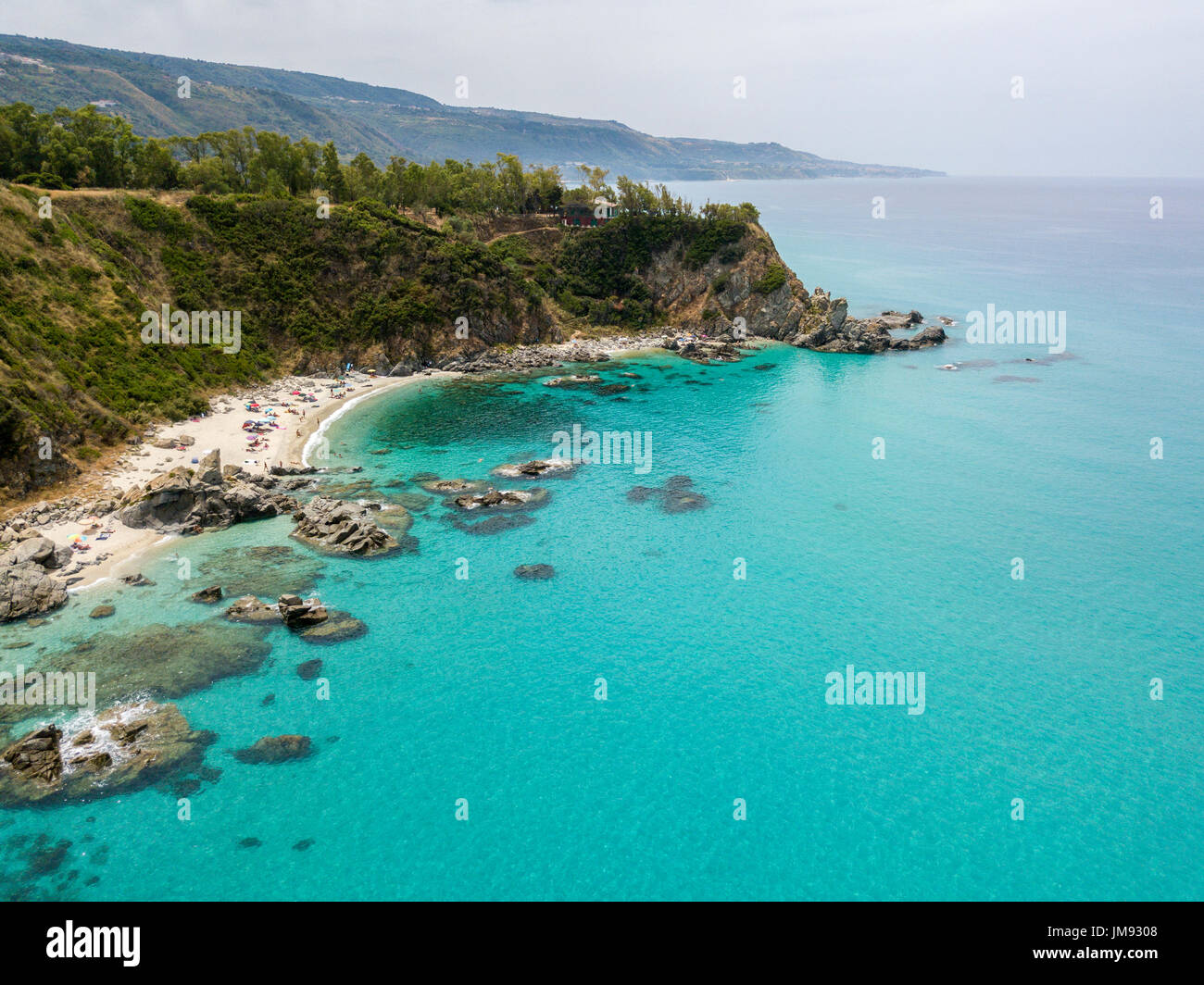 Paradise of the sub, beach with promontory overlooking the sea ...