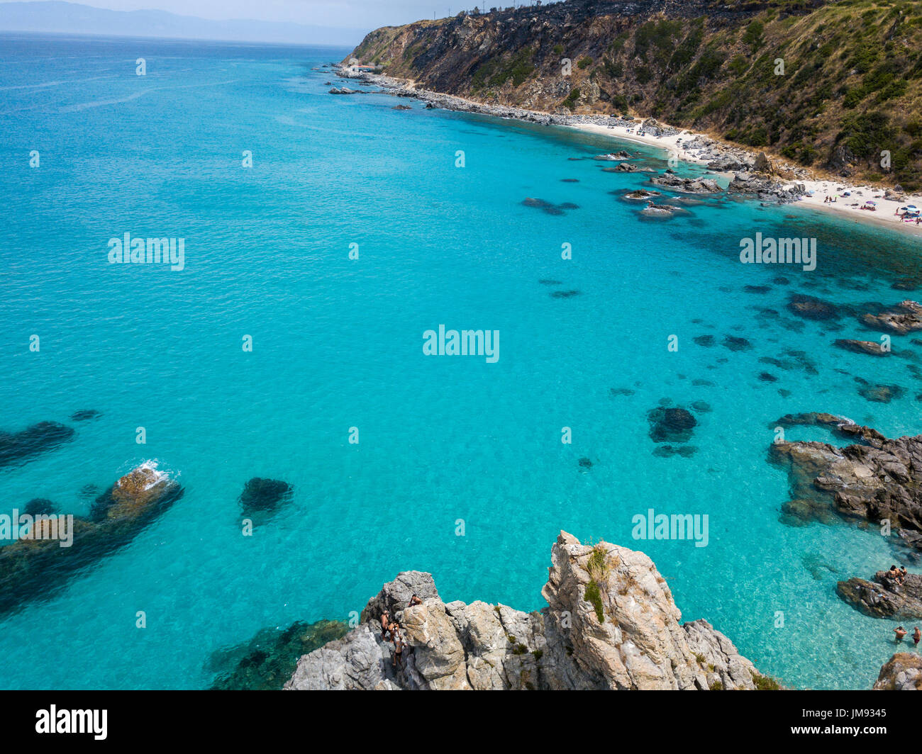 Paradise of the sub, beach with promontory overlooking the sea ...