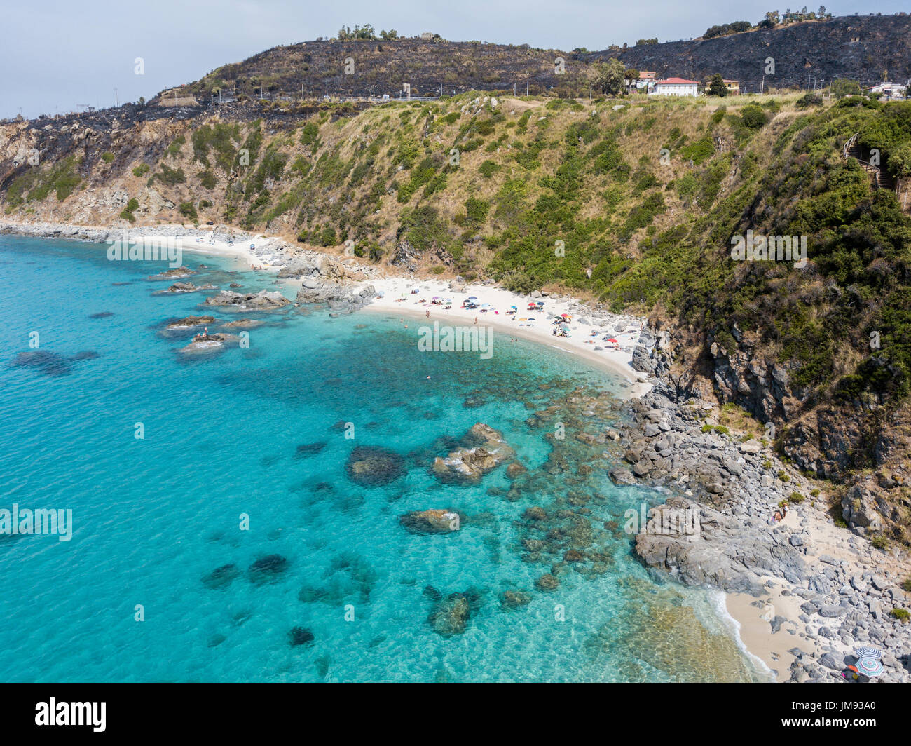 Paradise of the sub, beach with promontory overlooking the sea ...