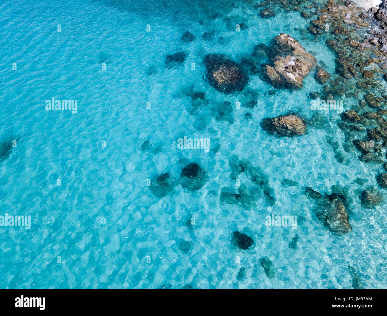 Aerial view of rocks on the sea. Overview of the seabed seen from above ...