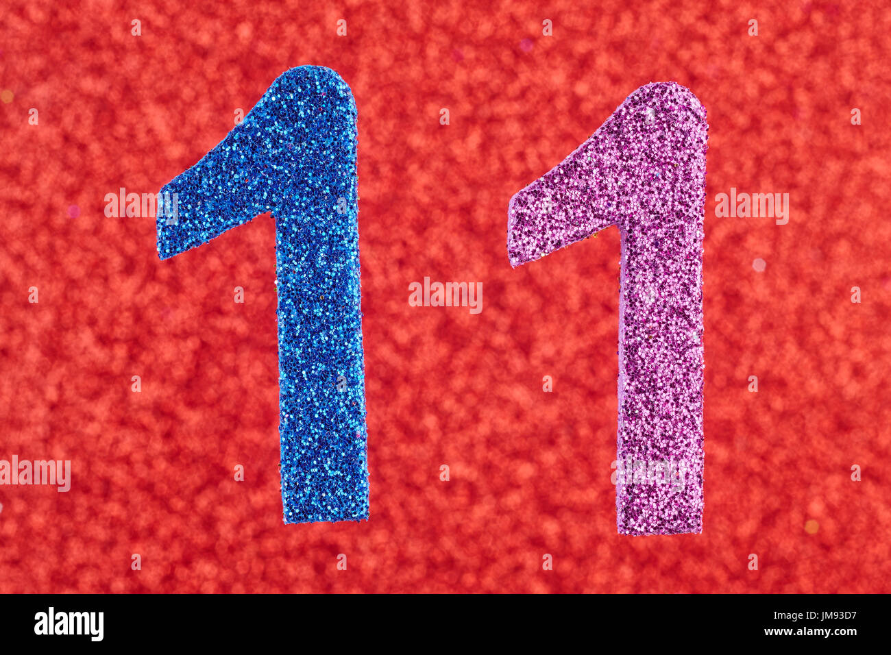 Number eleven blue purple color over a red background. Anniversary ...