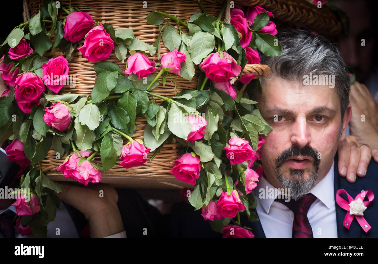 With the coffin after the funeral service for his daughter hi-res stock ...