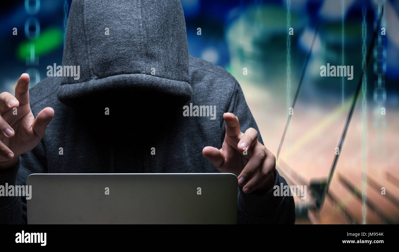 hacker with computer notebook Stock Photo - Alamy