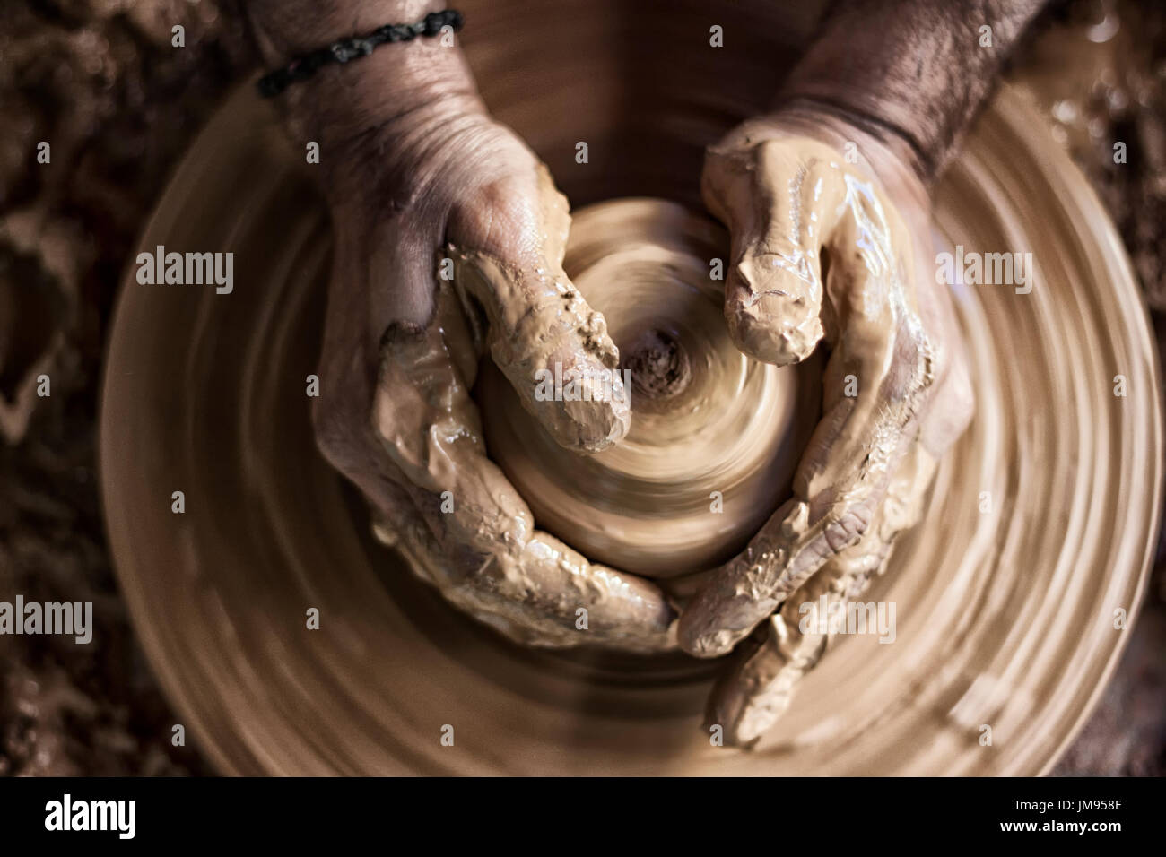 Potter making earthen or clay pots Stock Photo - Alamy