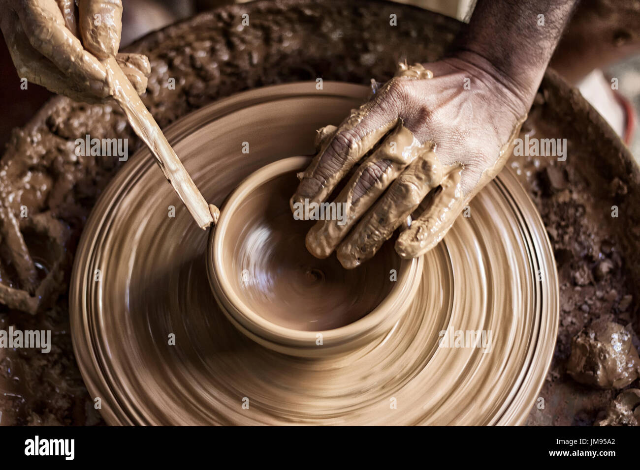 Potter making earthen or clay pots Stock Photo - Alamy