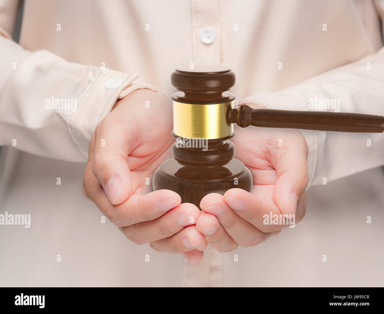 hand holding 3d rendering gavel judge Stock Photo - Alamy