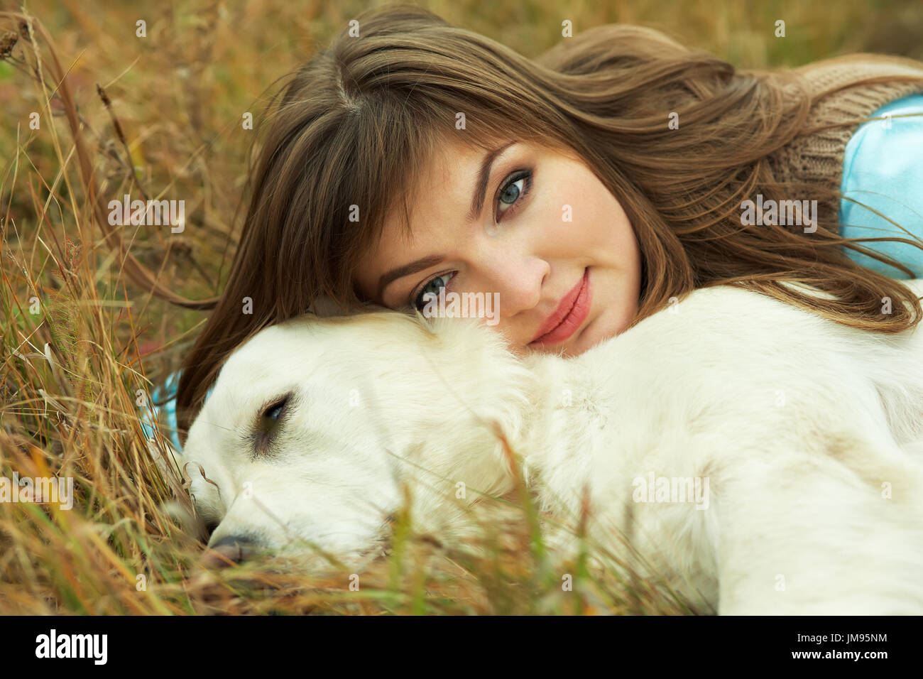 Labrador retriever with owner Stock Photo - Alamy