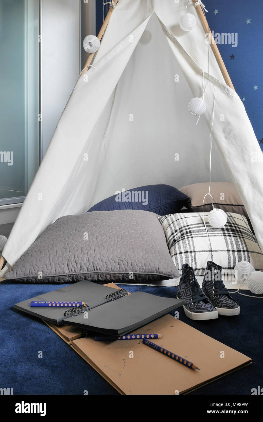 Tent style homework area in the living room Stock Photo - Alamy