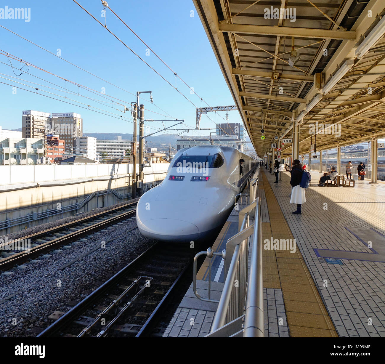 Tokyo, Japan - Jan 1, 2016. People waiting for the Shinkansen train at the JR station in Tokyo ...