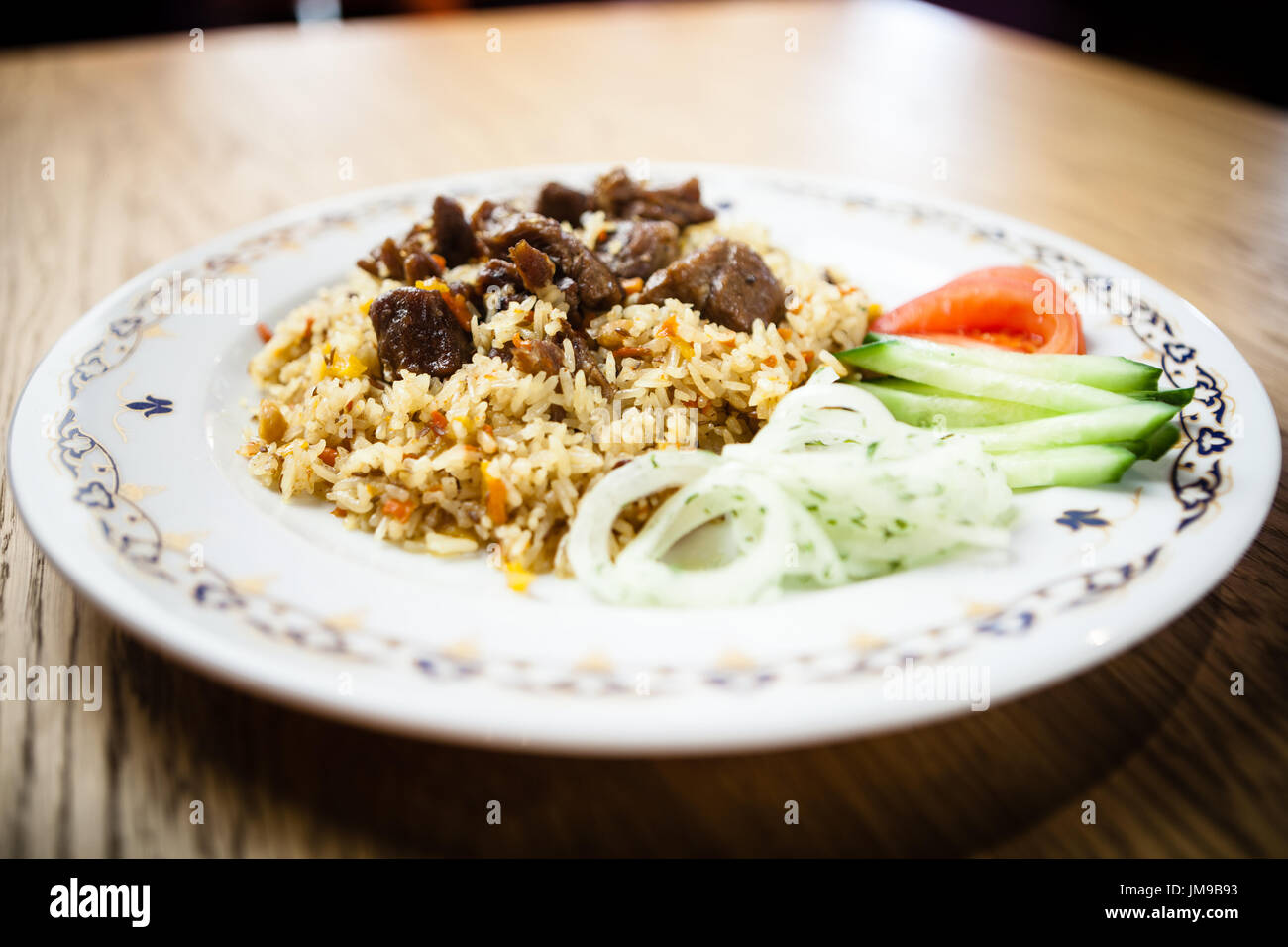 Uzbek pilaf with beef Stock Photo - Alamy