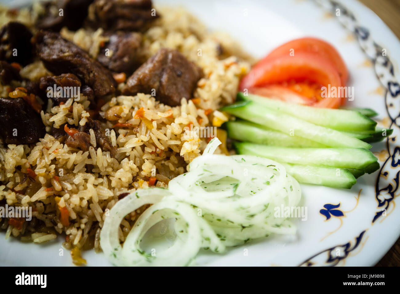 Uzbek pilaf with beef Stock Photo - Alamy