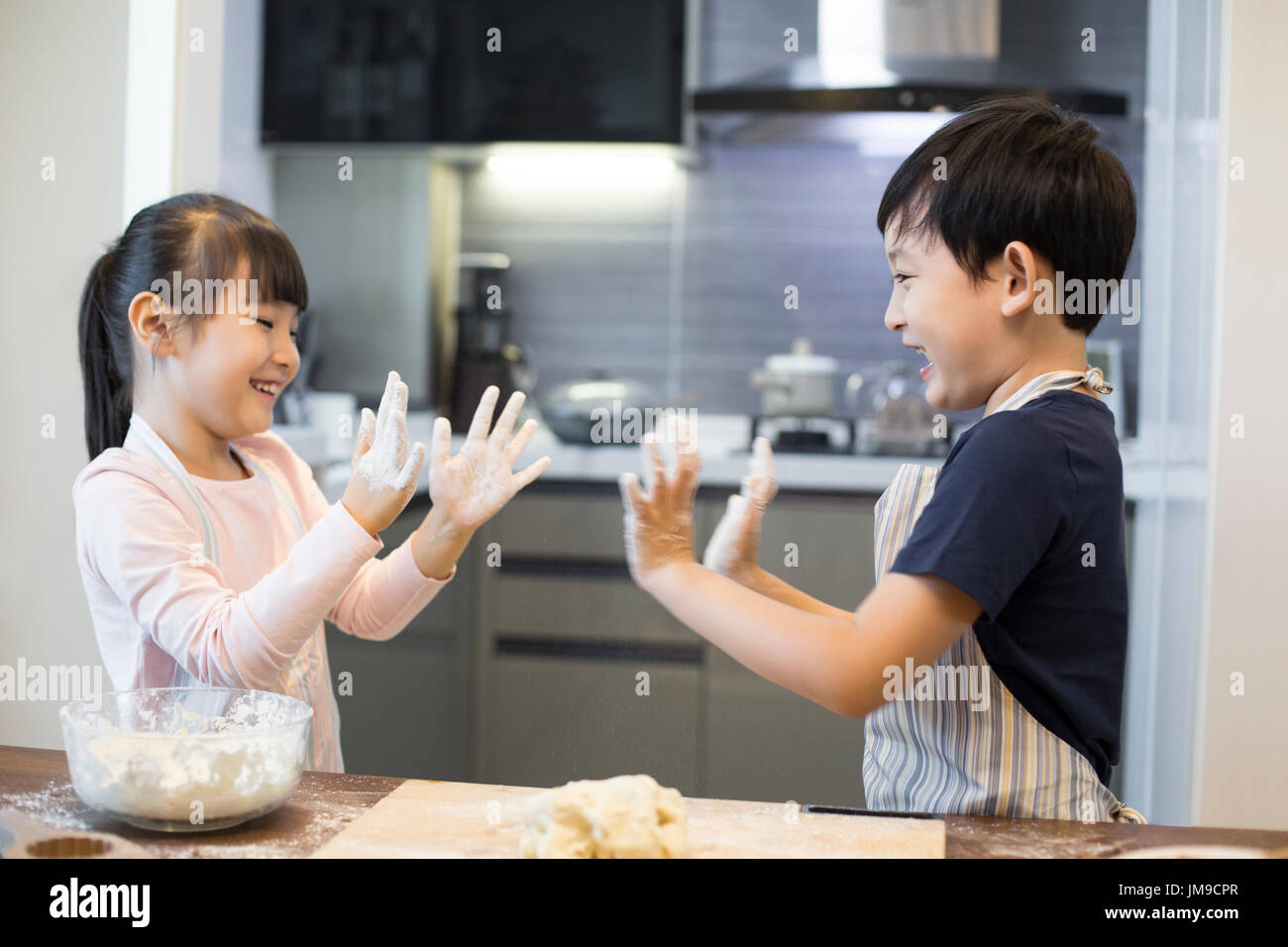 Two boys playing dough hi-res stock photography and images - Alamy
