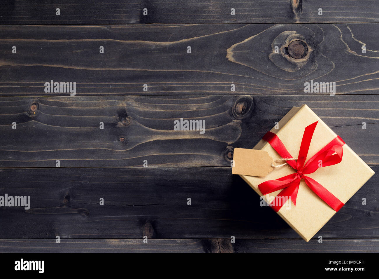 Brown gift box on rustic wood background with space for text Stock ...