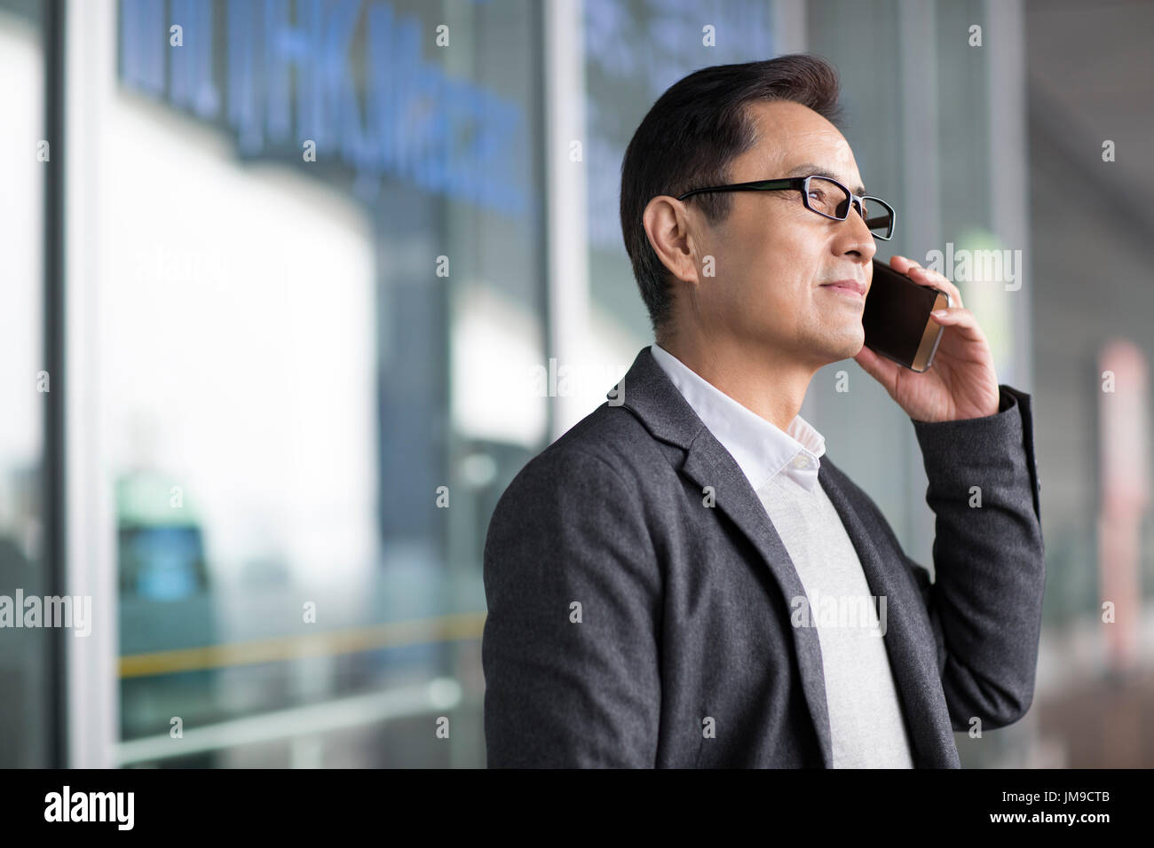 Asian man head and shoulders in suit hi-res stock photography and ...