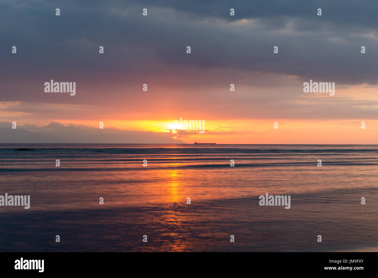 View at Bali island at sunset Stock Photo - Alamy