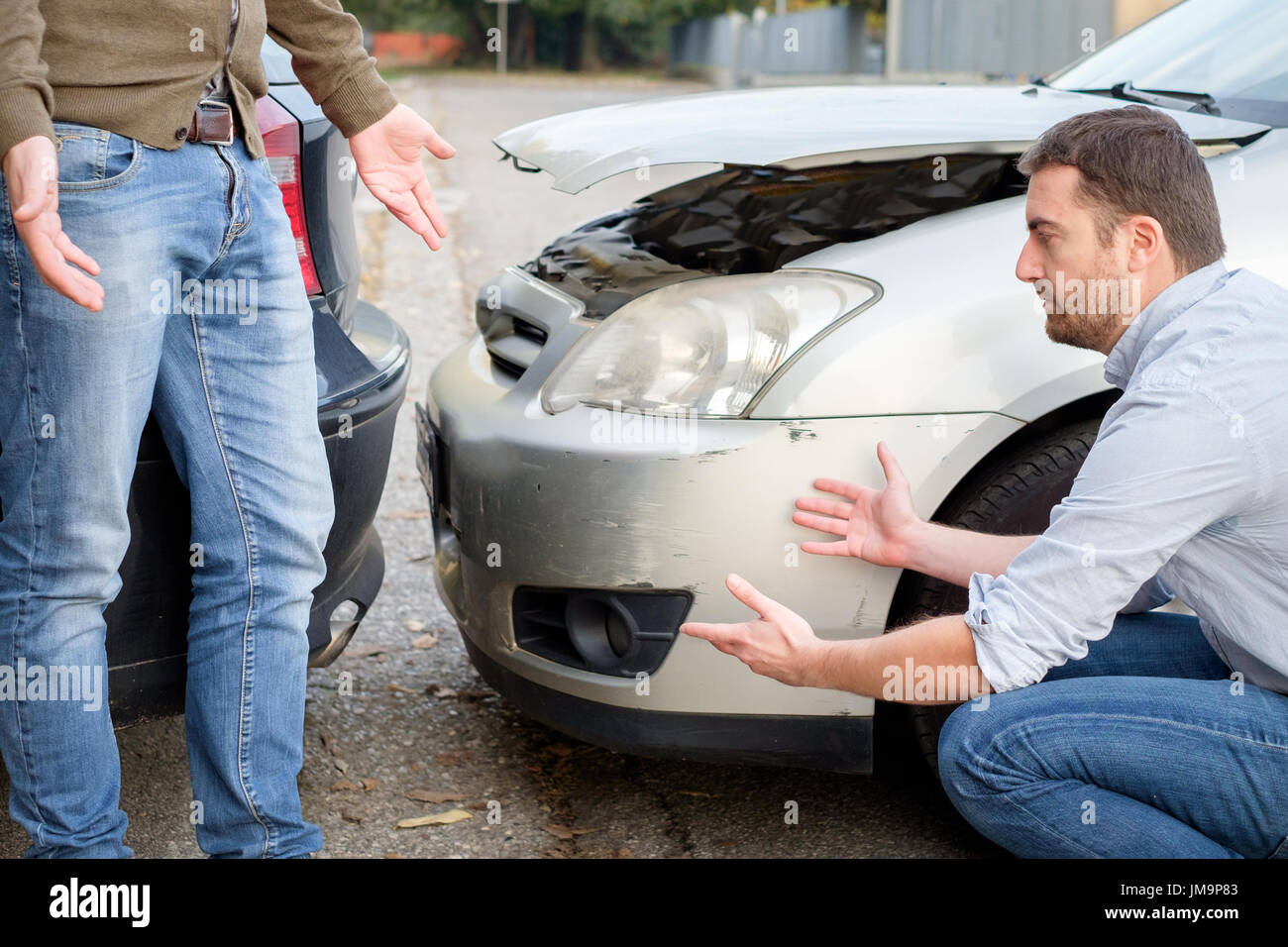 Two men car repair hi-res stock photography and images - Alamy