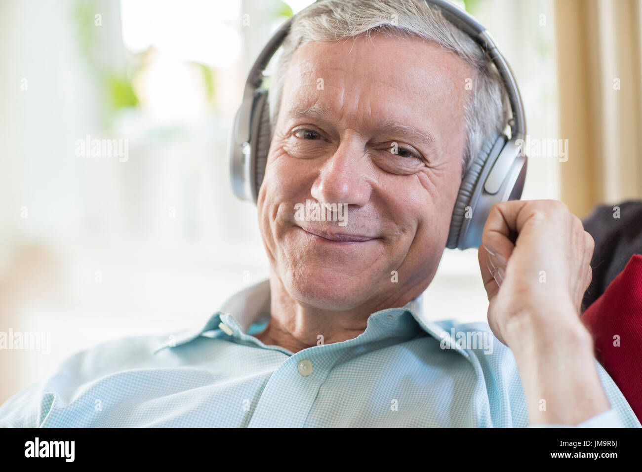 Portrait mature man headphones hi-res stock photography and images - Alamy