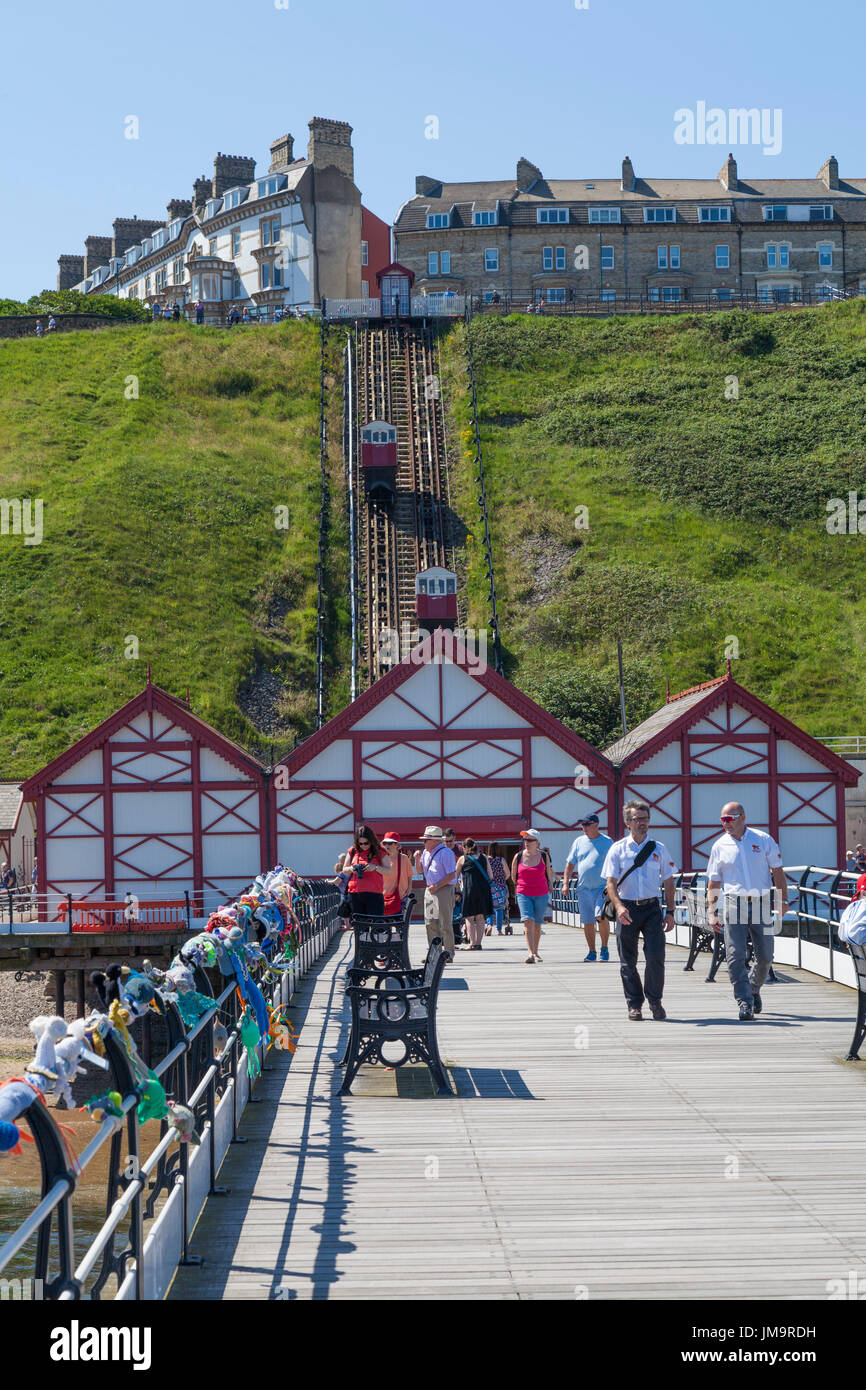A view of the cliff top from the pier including the cliff lift at ...