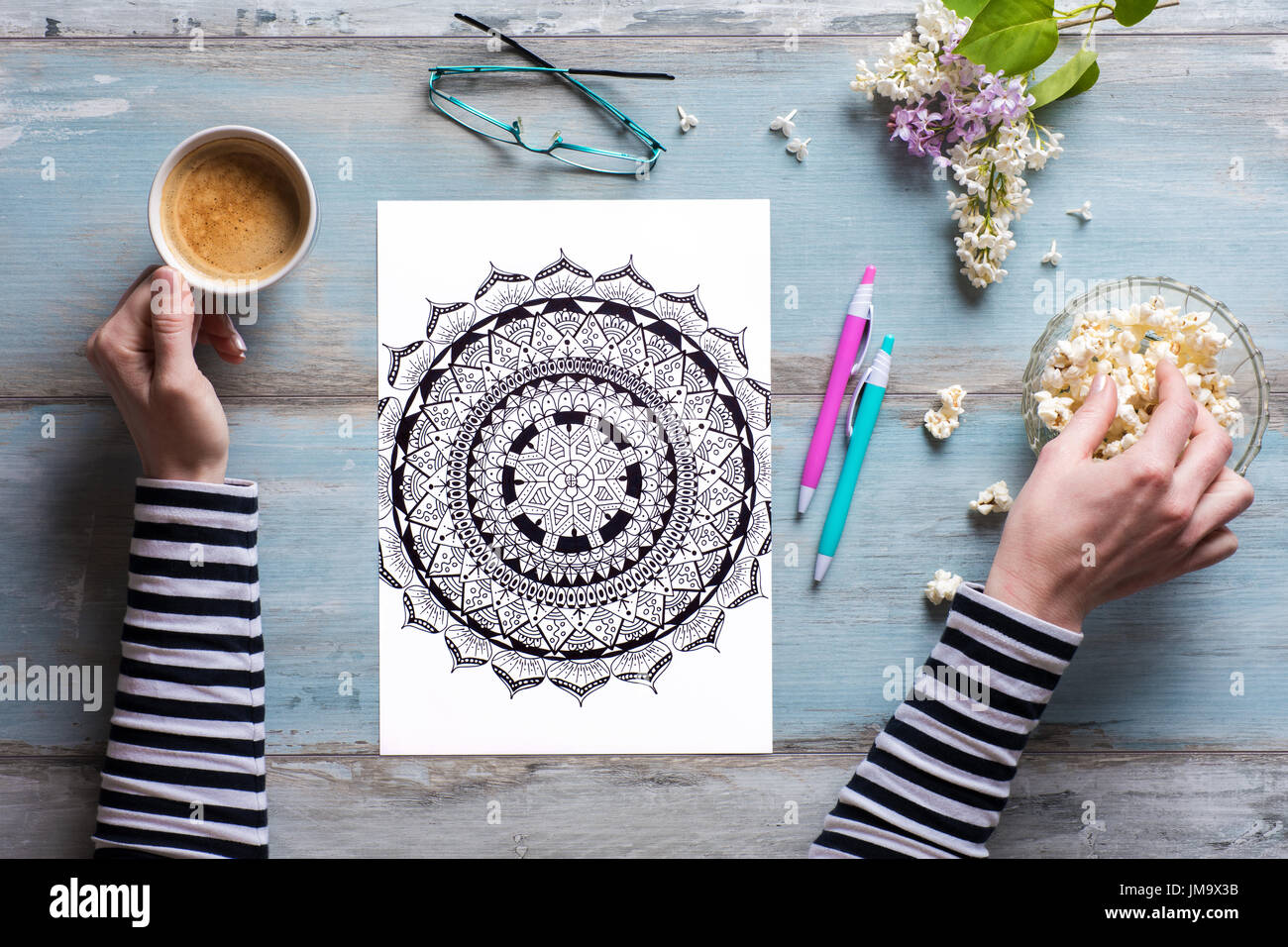 Flat lay, female colouring adult colouring books, new stress relieving ...