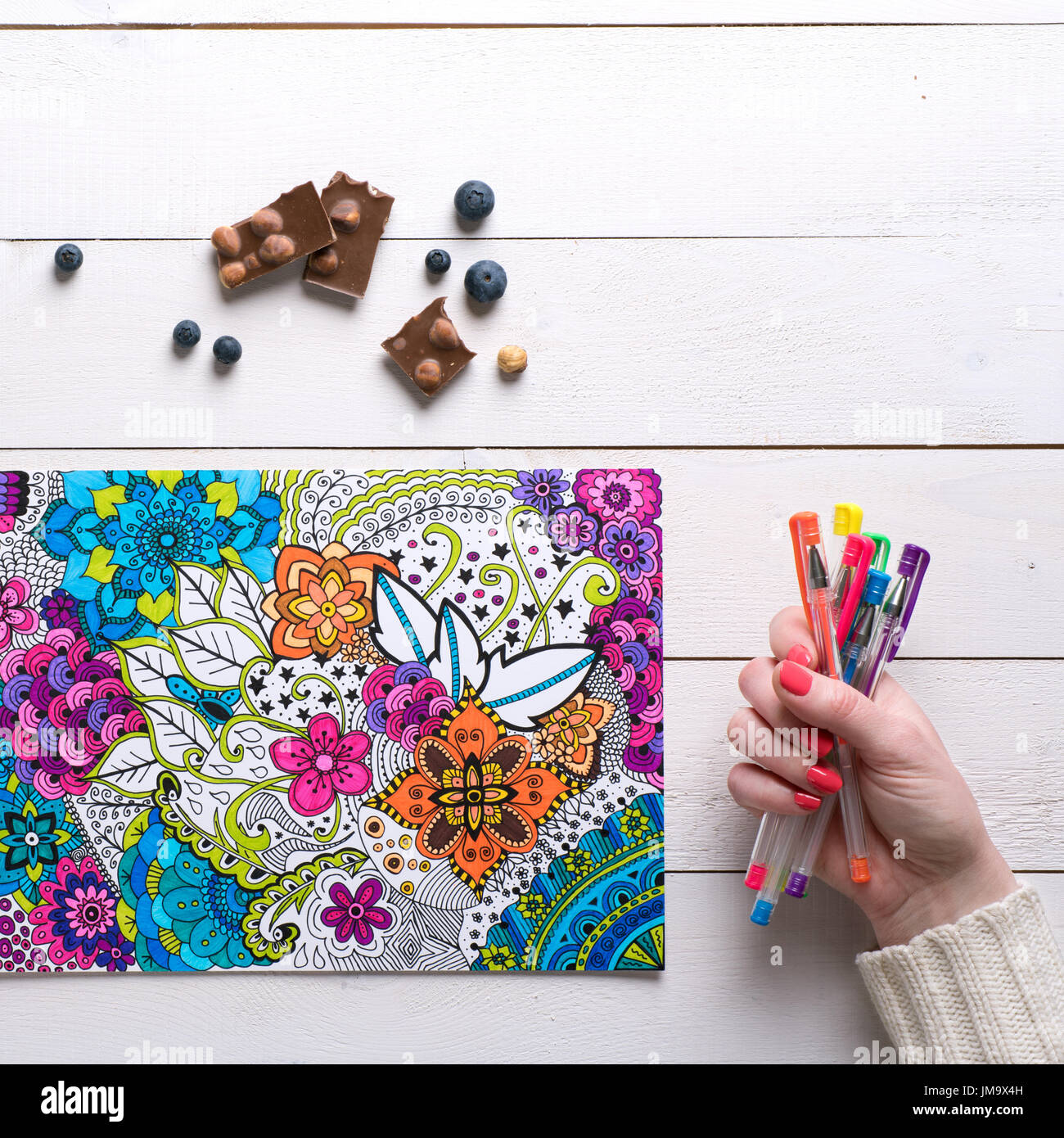 Flat lay, female colouring adult colouring books, new stress relieving ...