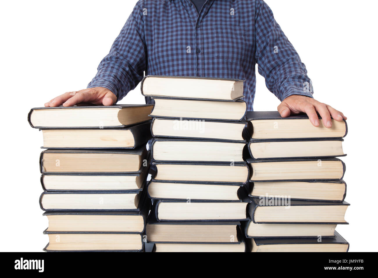 Man with hands on a pile of many old books isolated on white background ...