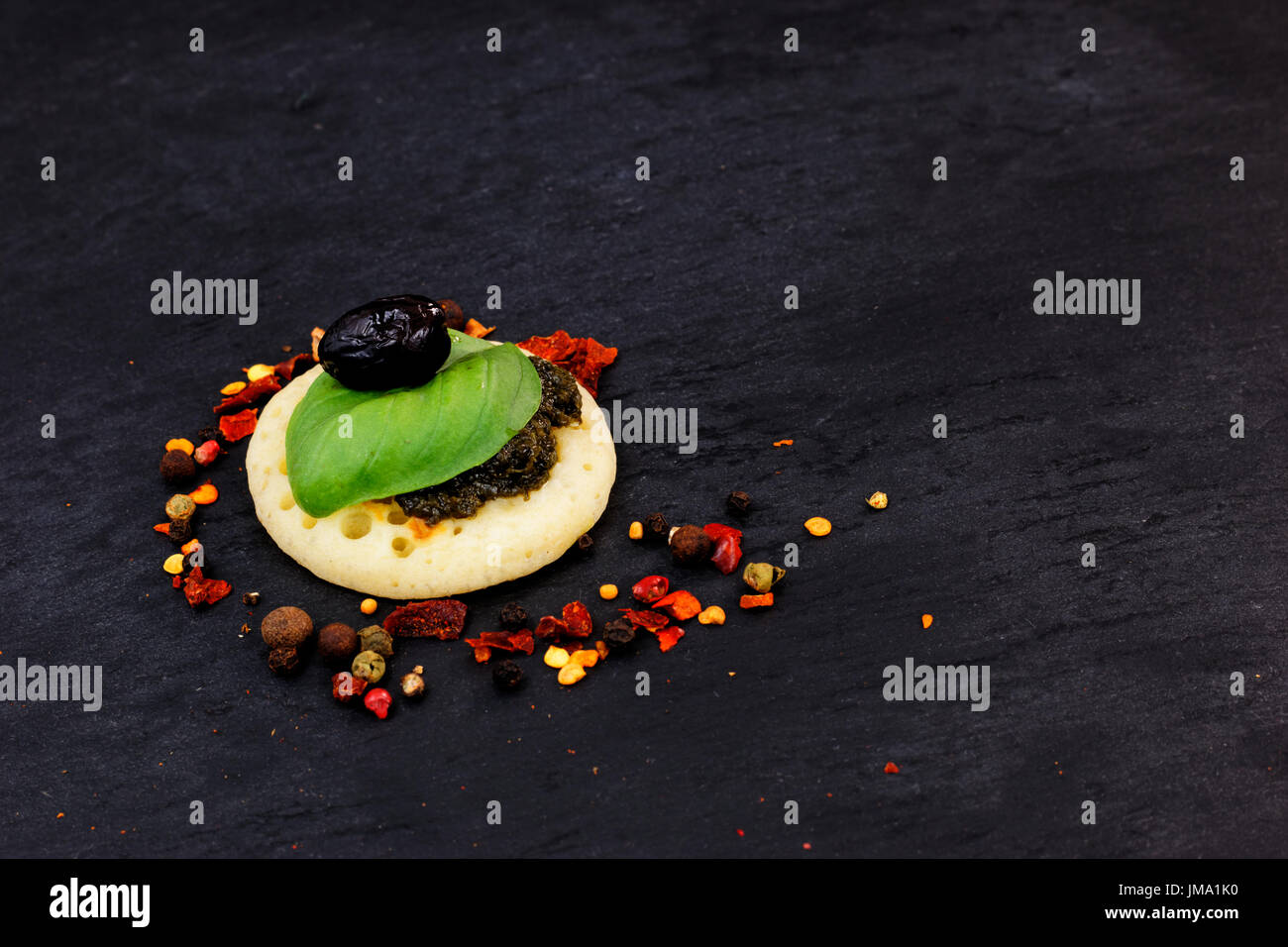 Homemade pancake canapes on slate stone plate for finger food party ...