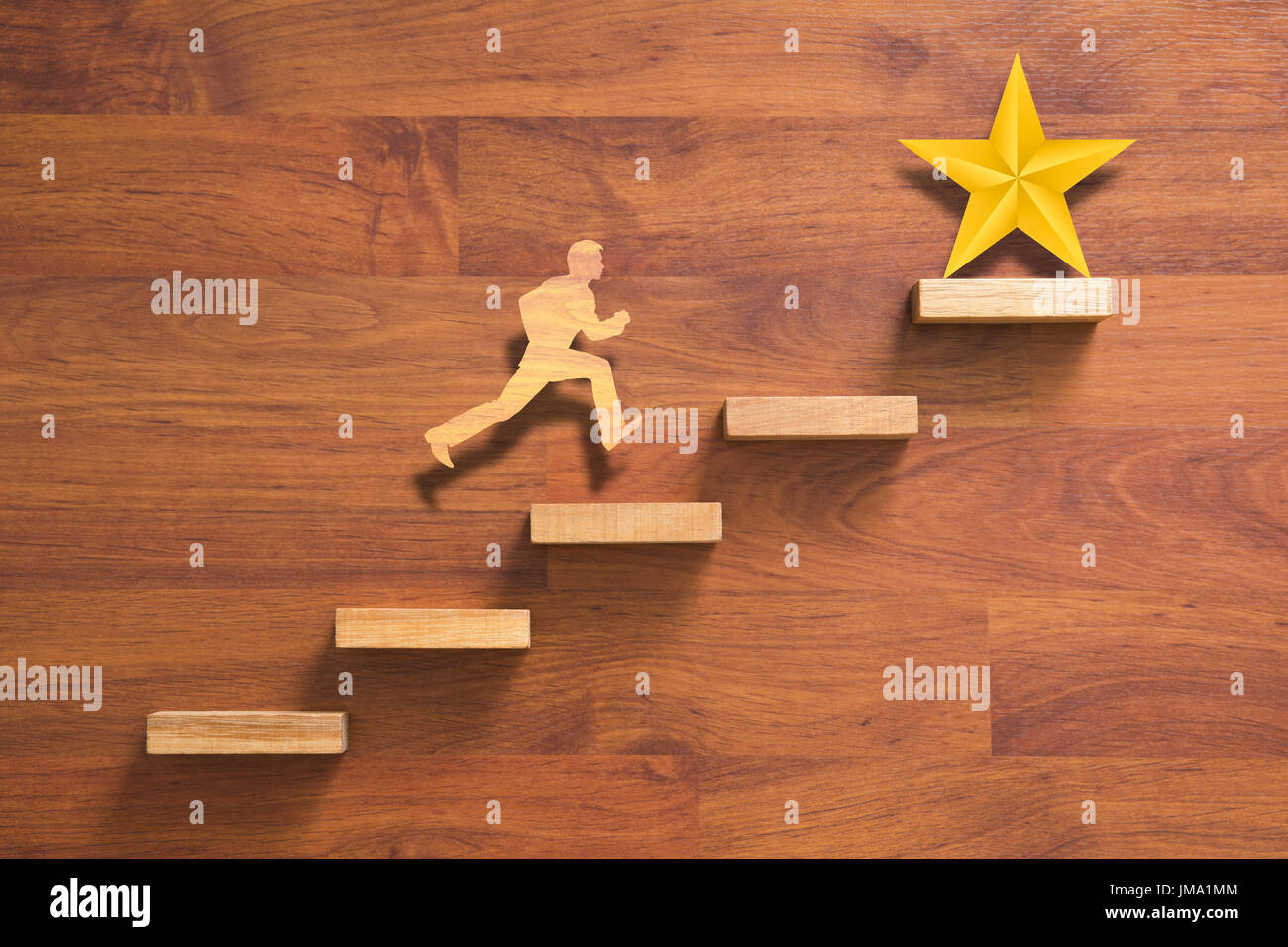 man running on stairs to success Stock Photo - Alamy