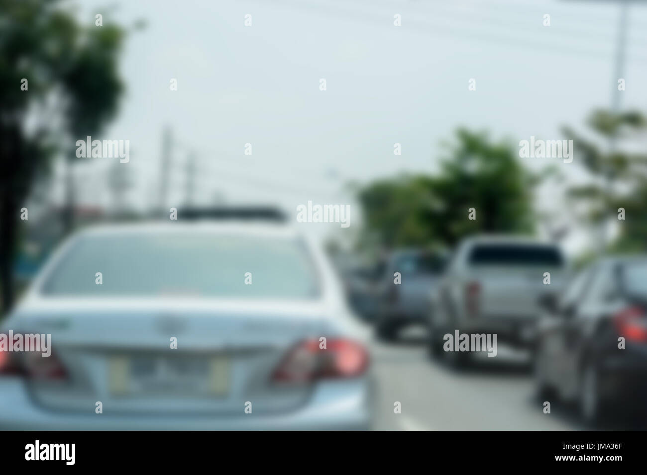 car driving on road with traffic jam, abstract blurred background Stock ...
