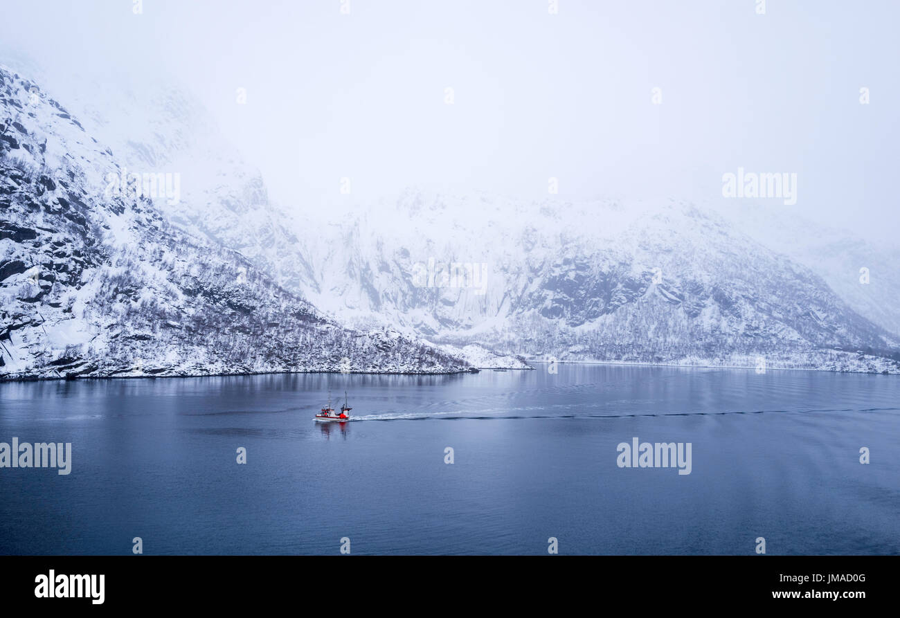 Fishing boat in the Lofoten Islands, Norway, seen from a Hurtigruten ...