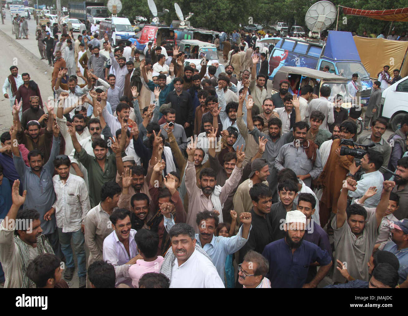 Pakistan. 26th July, 2017. Truck drivers are jubilant after successful ...