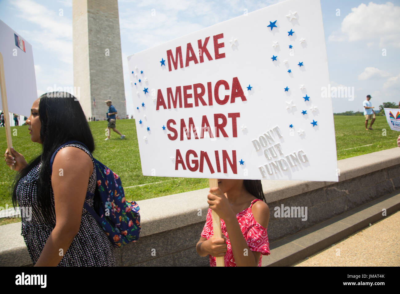 "Make America Smart Again" says this young demonstrator at the "March ...