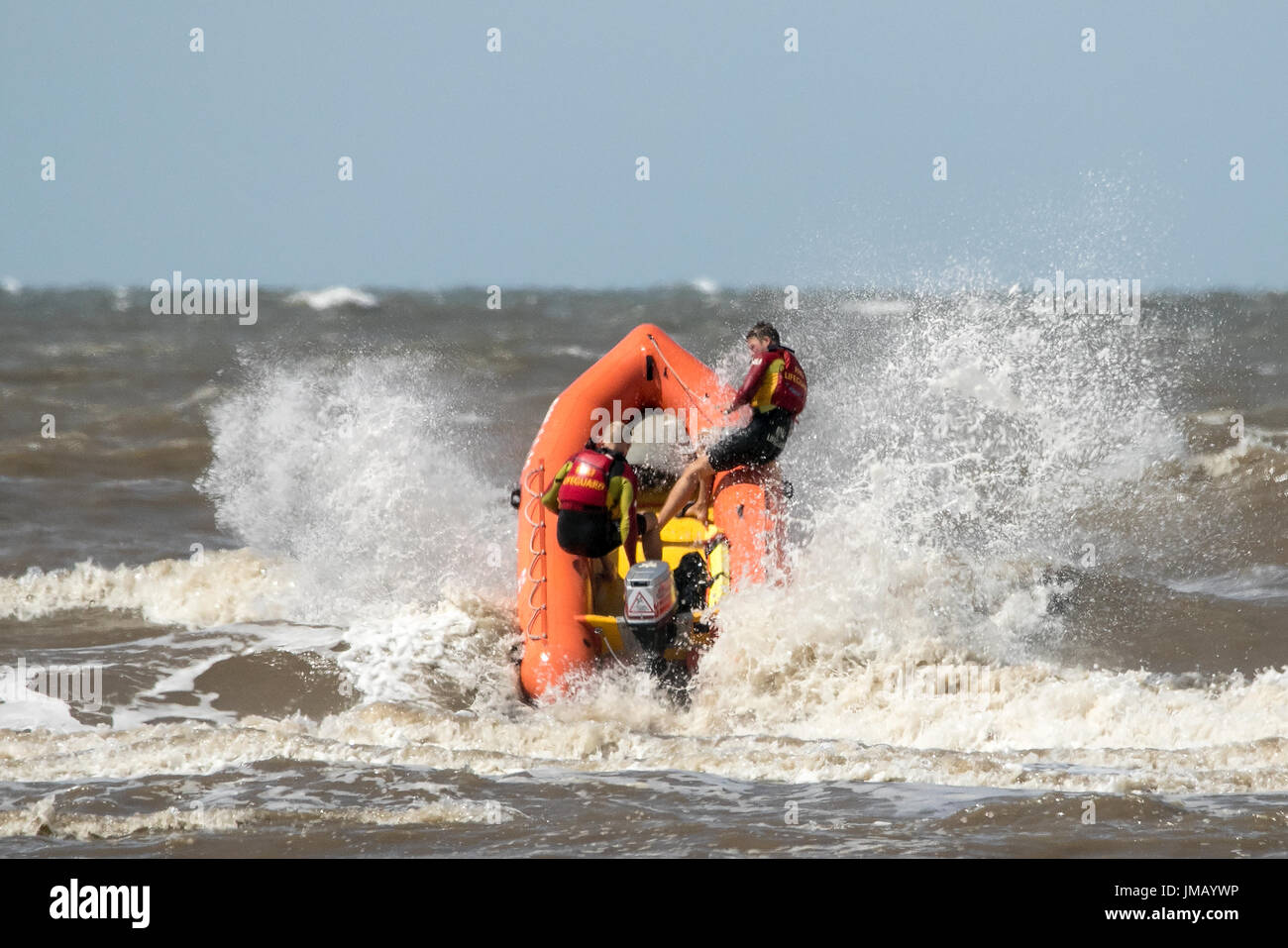 RNLI lifeguard at sea, save rescue rescuer emergency drown drowning ...