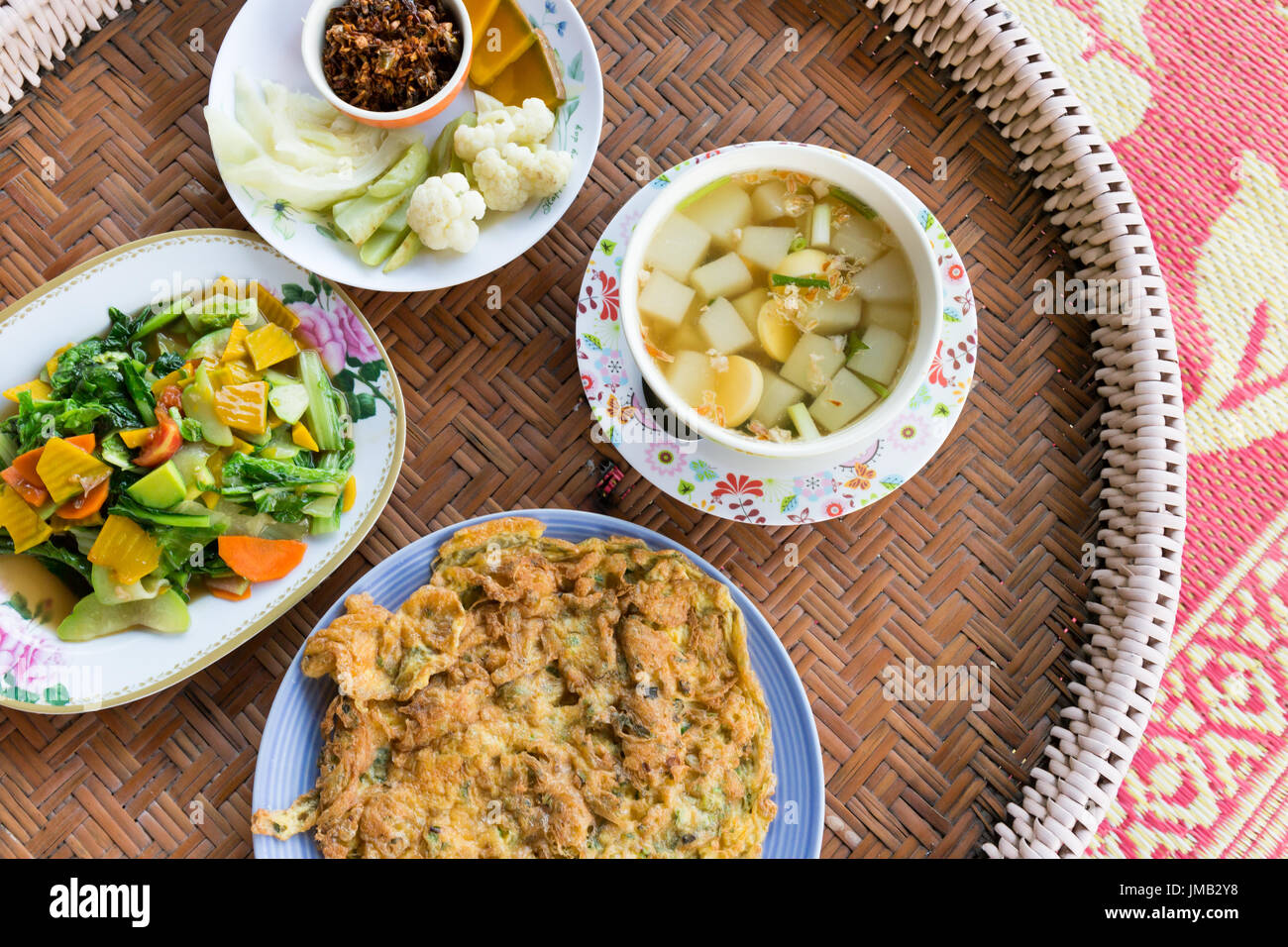 Four foods on circle table Stock Photo - Alamy