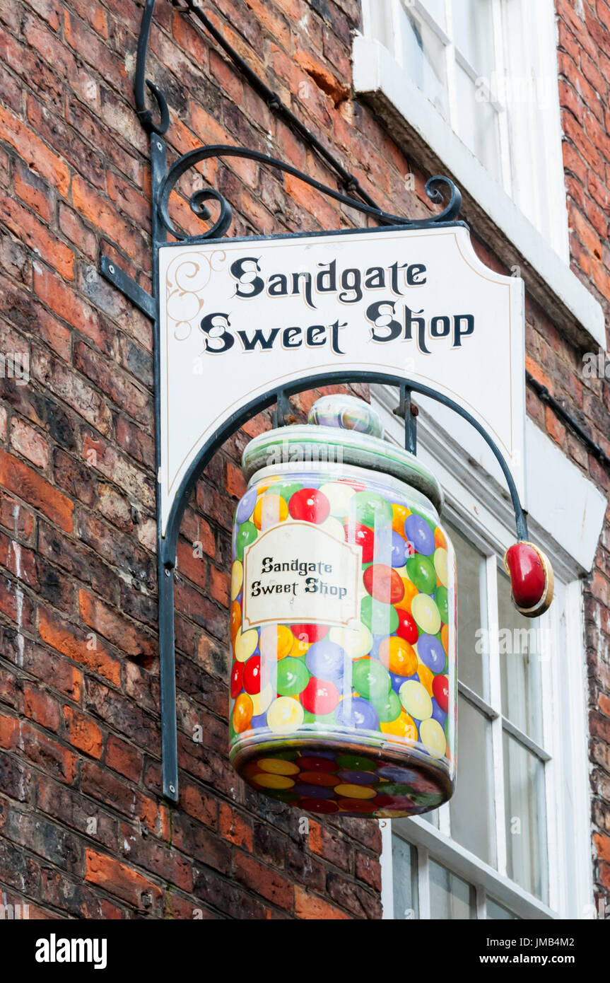 A sign for Sandgate Sweet Shop on a shop in Whitby, North Yorkshire ...