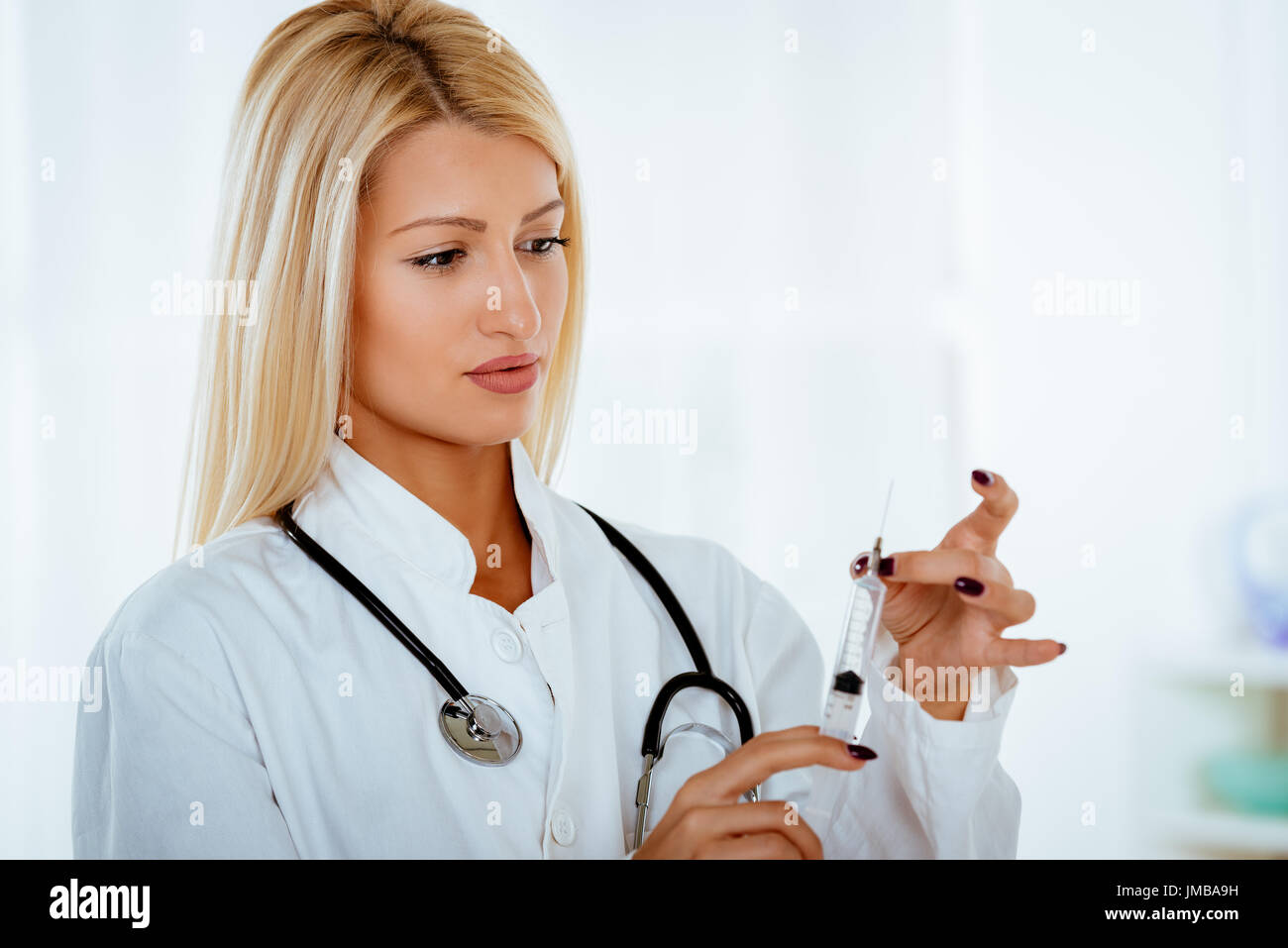 Beautiful nurse injection hi-res stock photography and images - Alamy