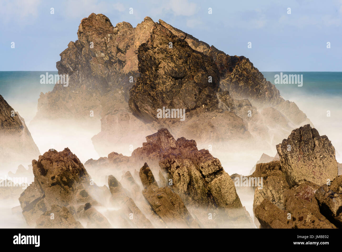 Large rocks in the ocean Stock Photo - Alamy