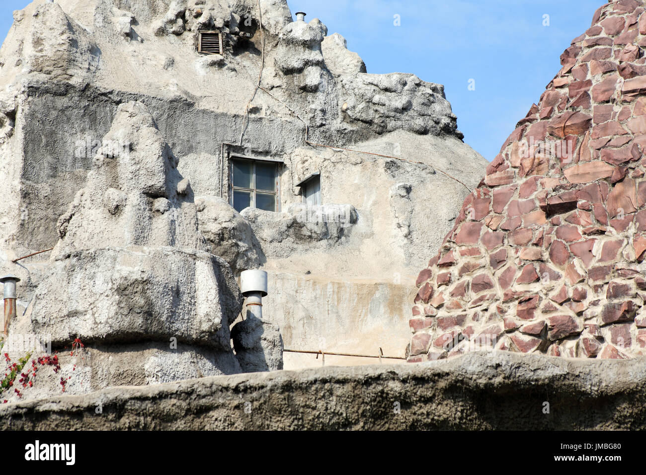 Strange house hand-generated inside rock Stock Photo - Alamy
