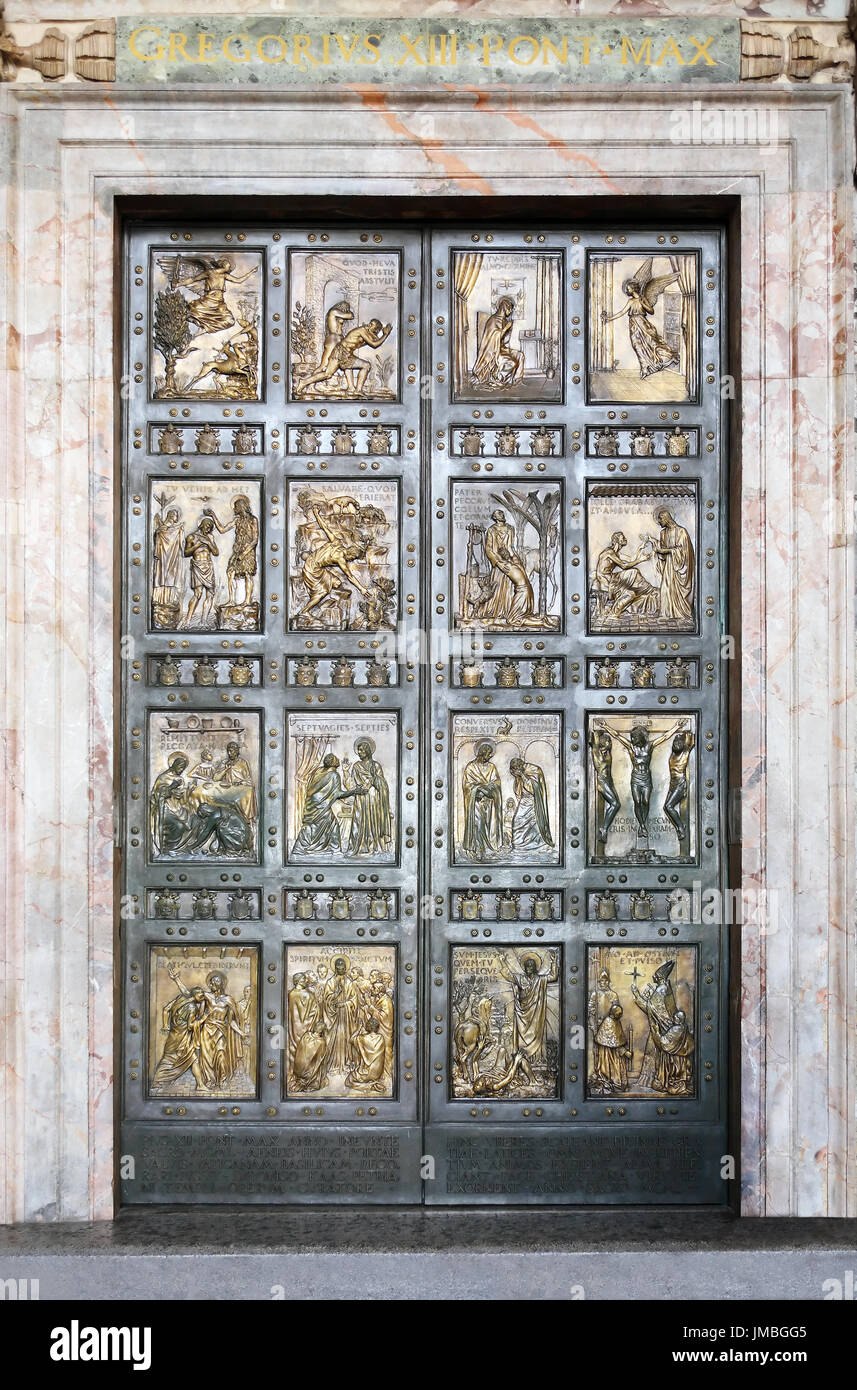 The famous Holy Door at St. Peters Basilica in Vatican. Rome, Italy ...